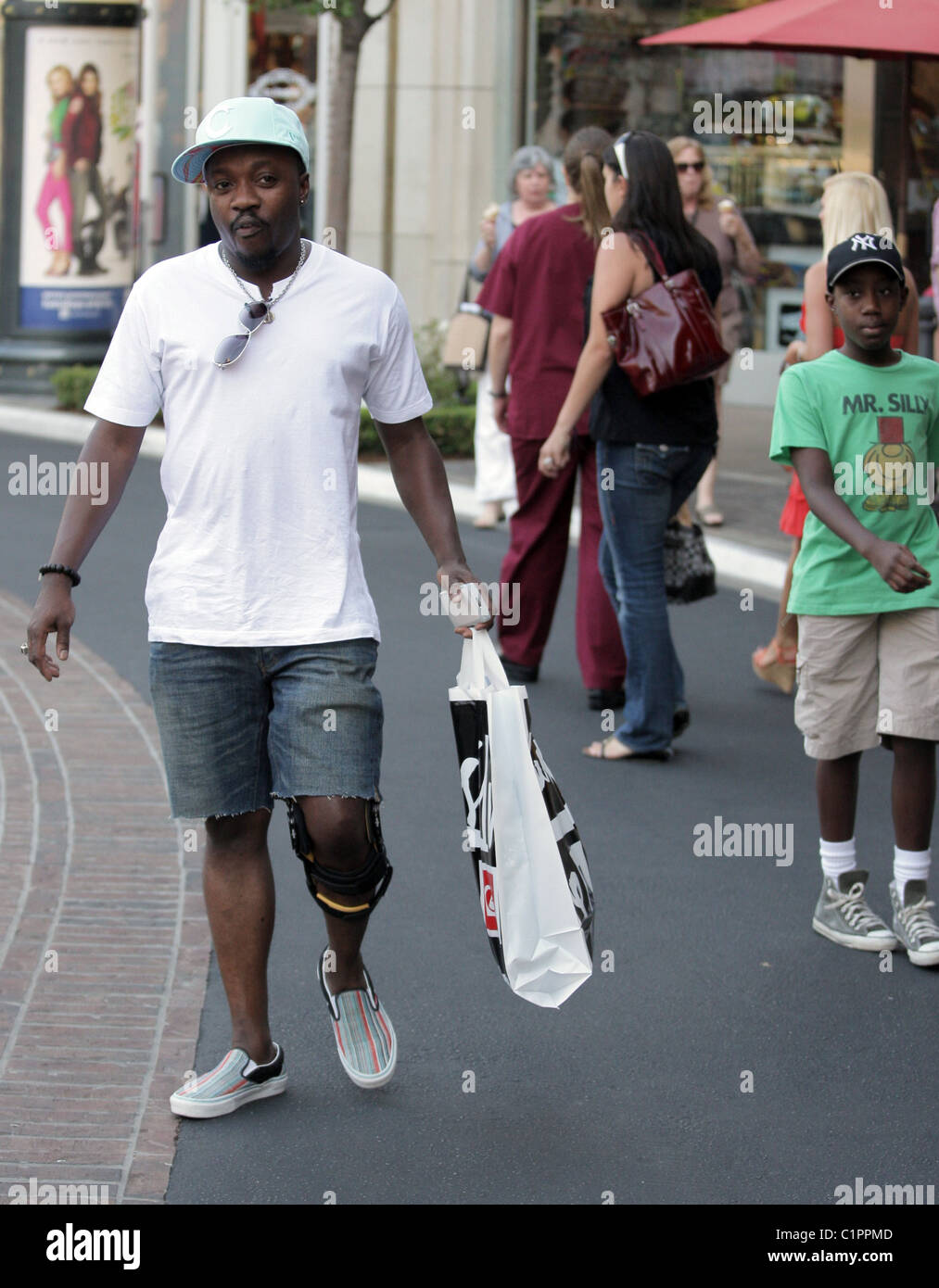 Derrick Hamilton out shopping with his son in Hollywood Los Angeles ...