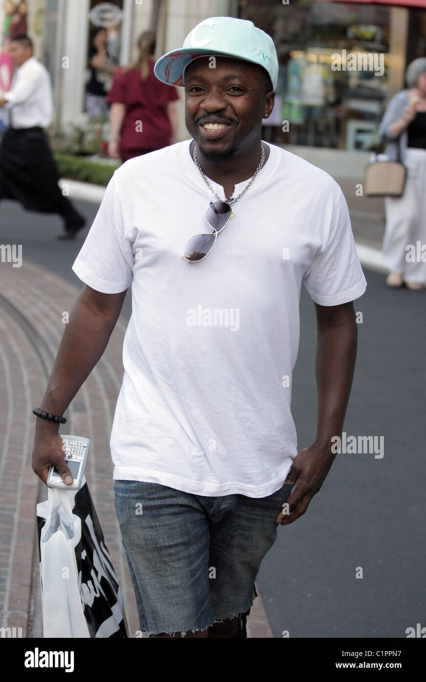 Derrick Hamilton out shopping with his son in Hollywood Los Angeles ...