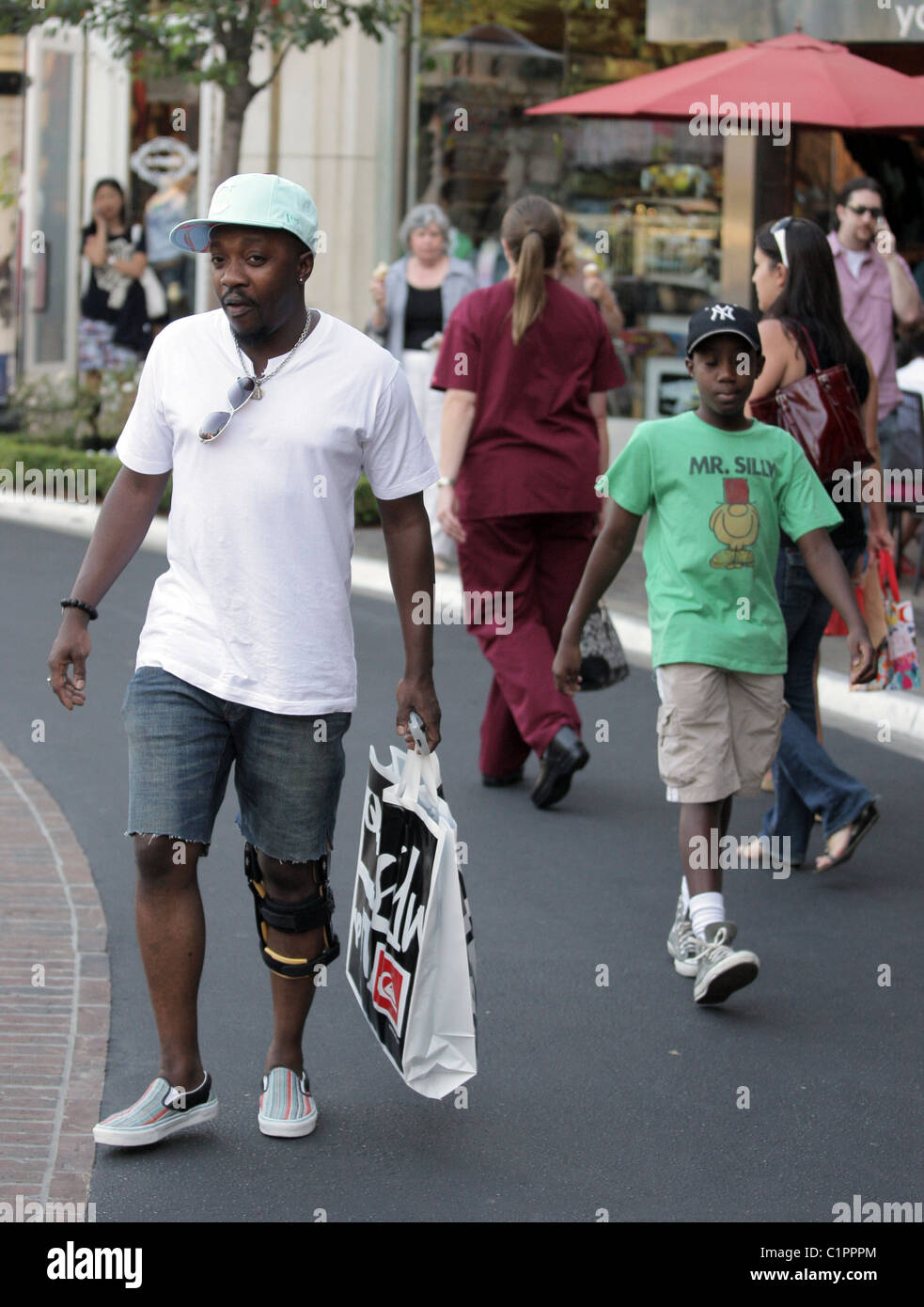 Derrick Hamilton out shopping with his son in Hollywood Los Angeles ...