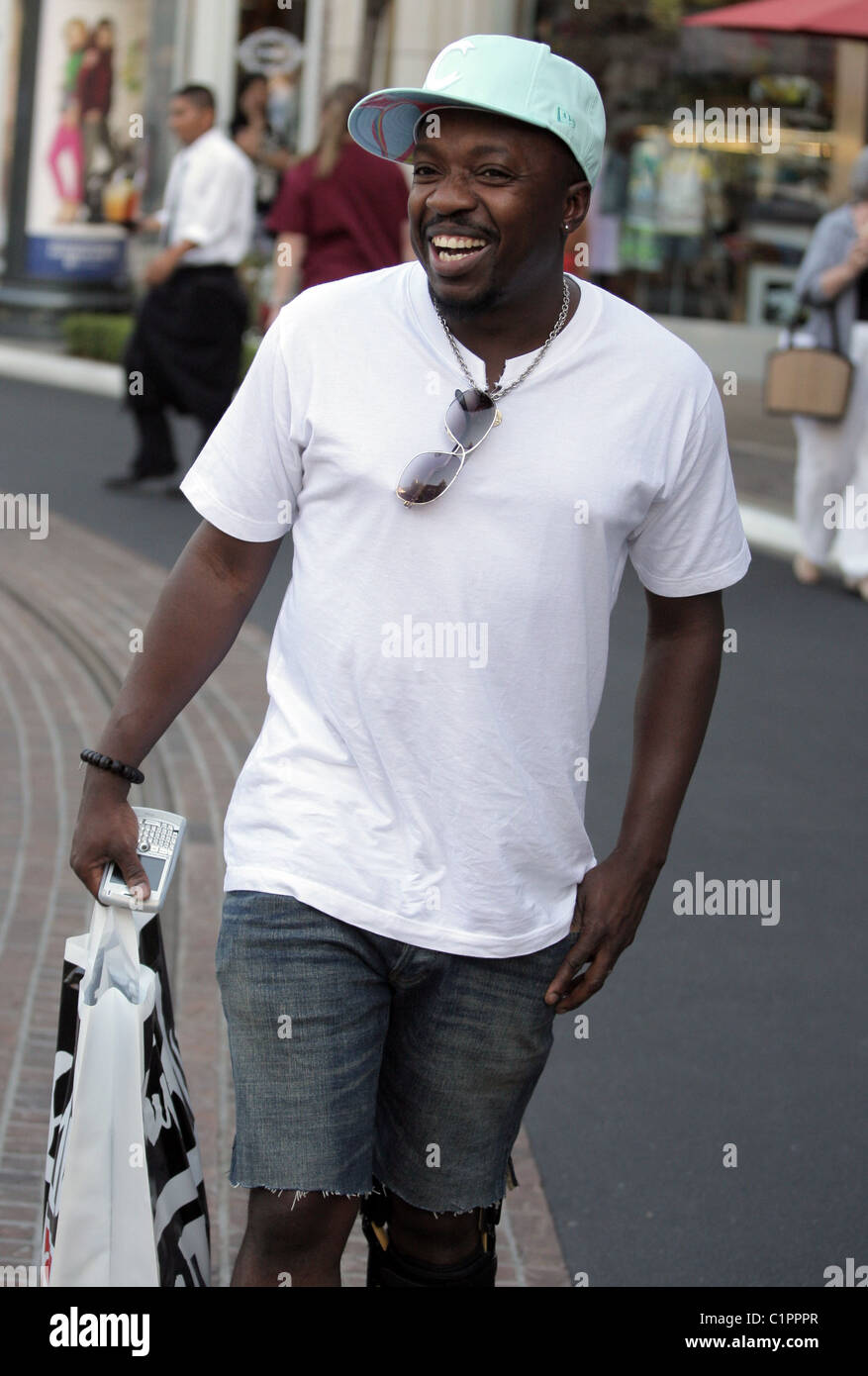 Derrick Hamilton out shopping with his son in Hollywood Los Angeles ...