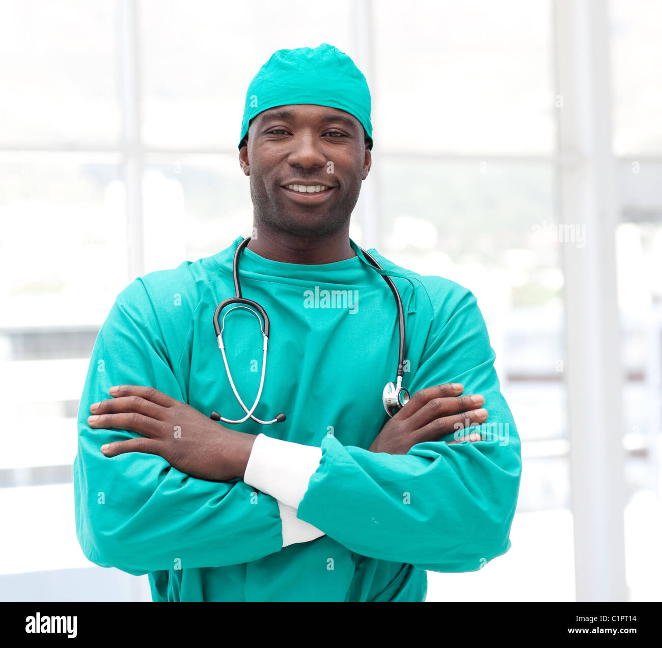 Young surgeon with folded arms Stock Photo - Alamy