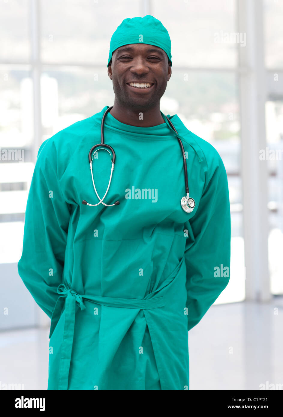 Charming doctor in green scrubs Stock Photo - Alamy
