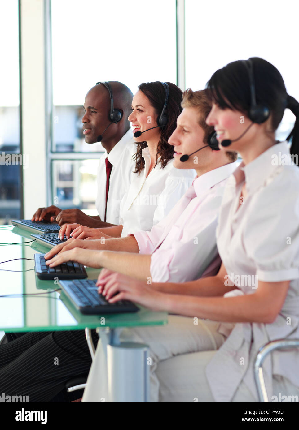 Portrait of a happy sale representative team at work Stock Photo - Alamy