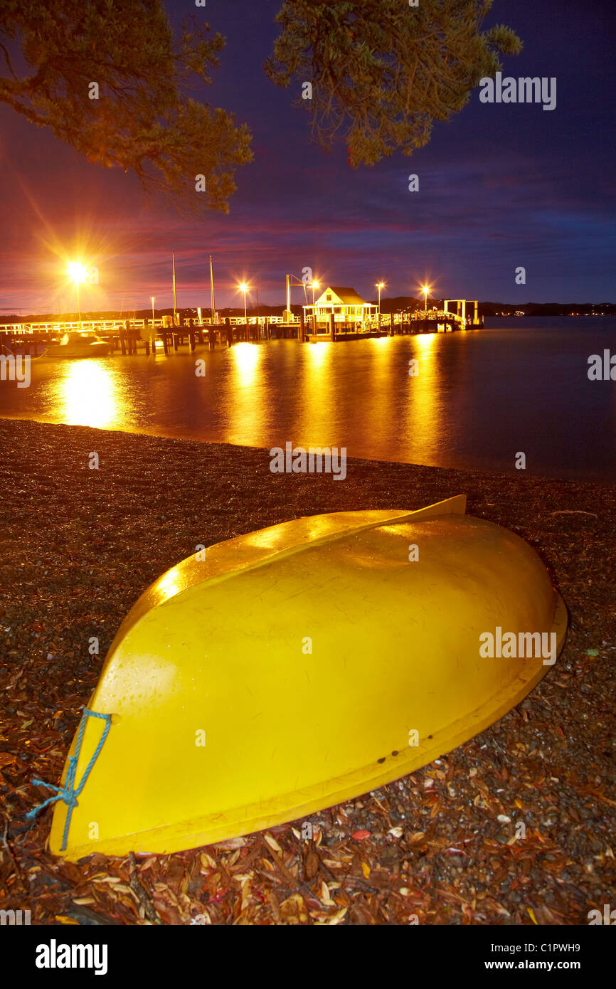 Yellow dinghy and wharf at dusk, Russell, Bay of Islands, Northland ...