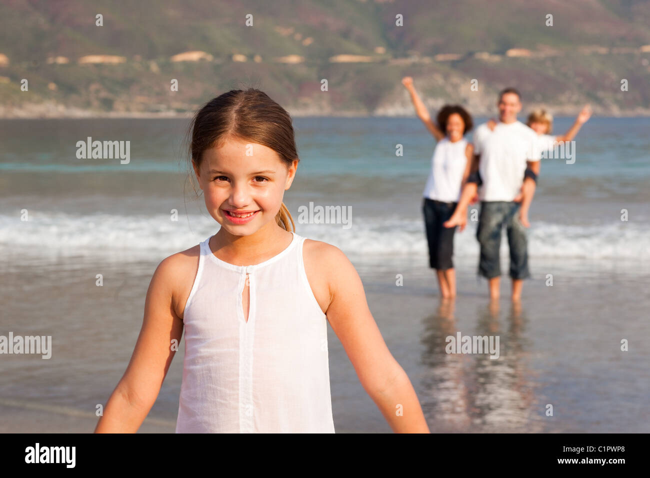 Portrait of a cute family having fun Stock Photo - Alamy