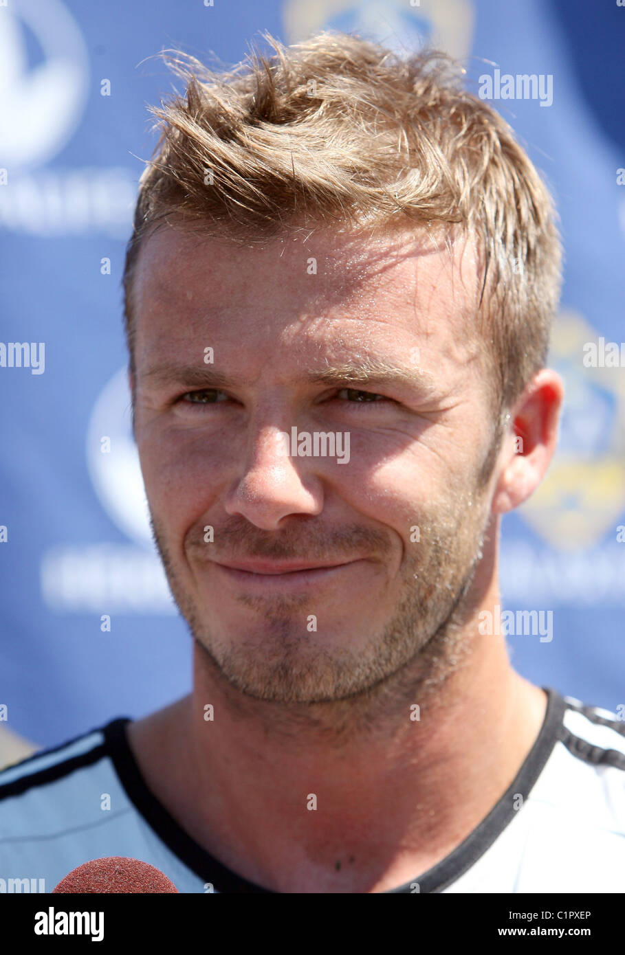 David Beckham is interviewed after his first training session for the ...