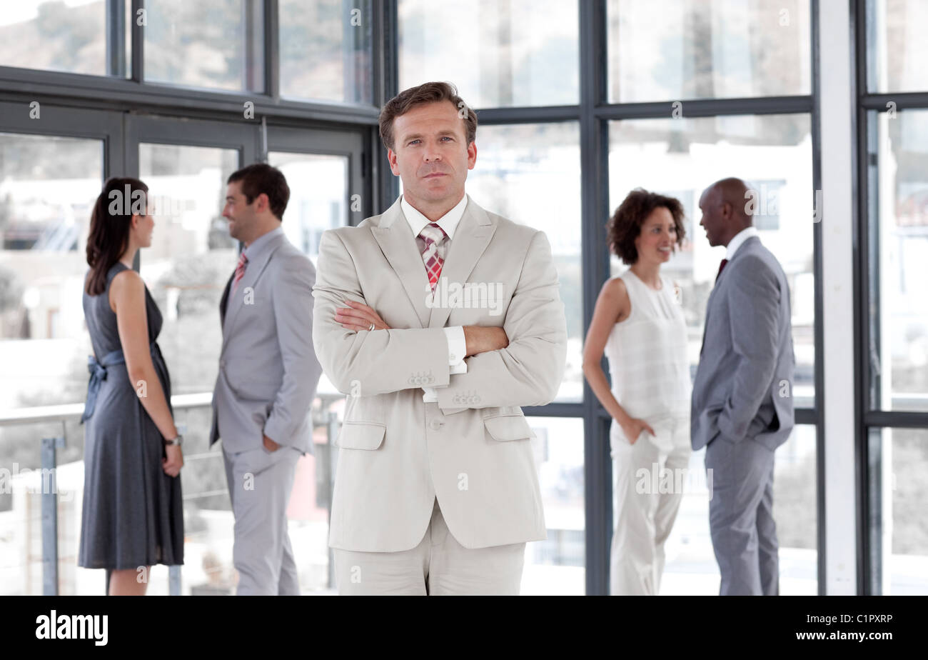 portrait of a male manager leading his team Stock Photo - Alamy