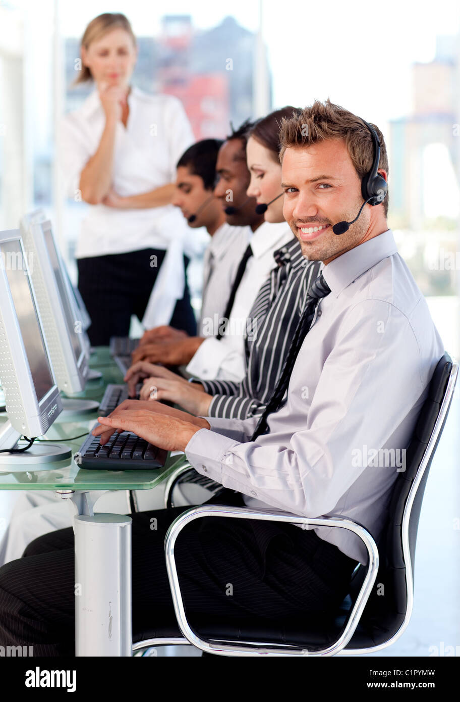 Glowing female manager leading her representative team Stock Photo - Alamy