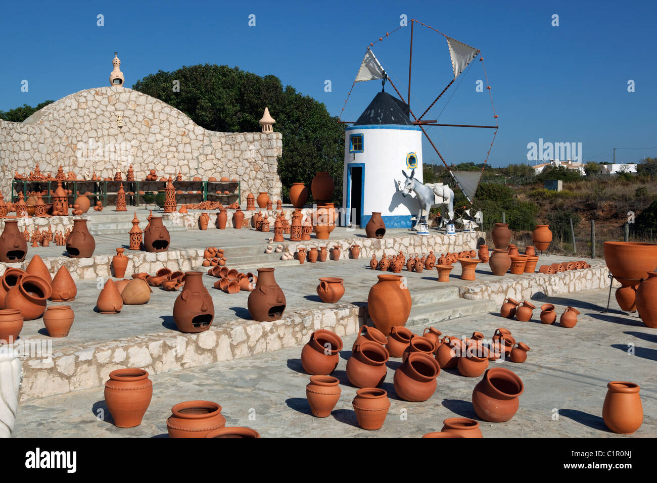 Algarve pottery in shop Stock Photo - Alamy