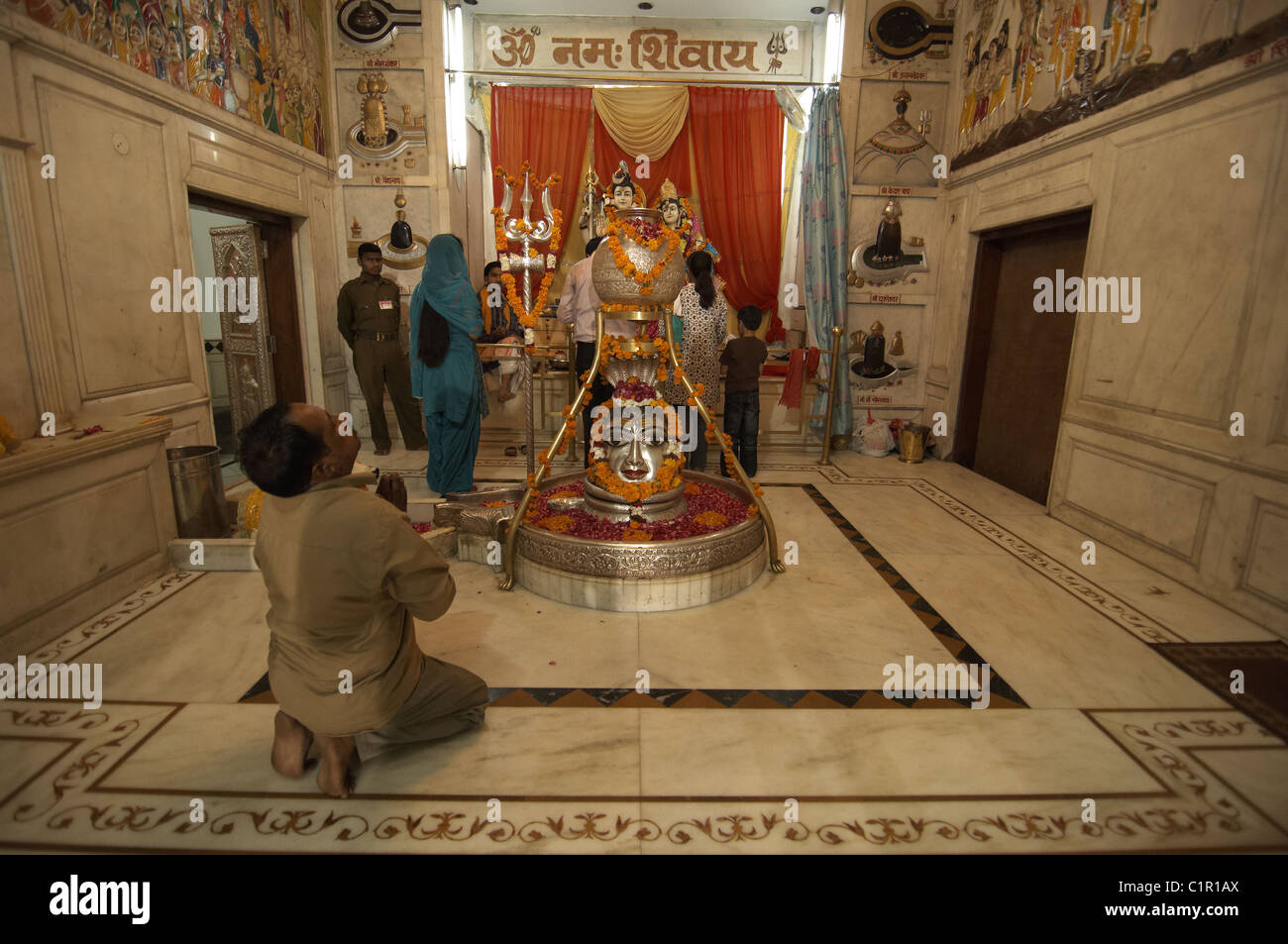 Praying in a temple hi-res stock photography and images - Alamy