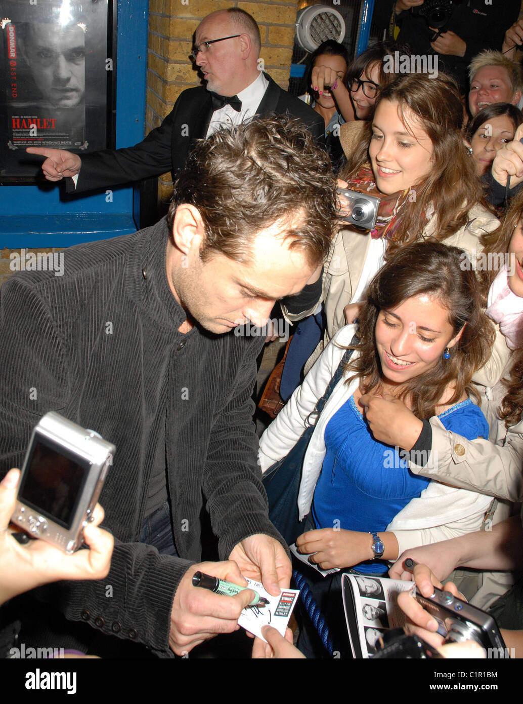 Jude Law leaves the Wyndham Theatre having performed in 'Hamlet' and is ...