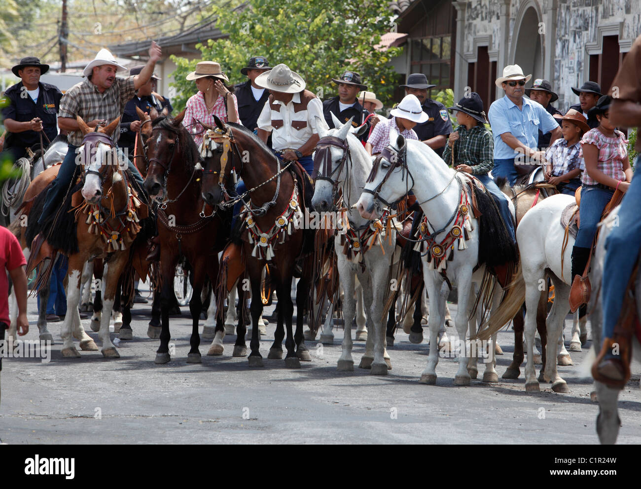 Men and women riding horses in the civic festival horse parade in ...