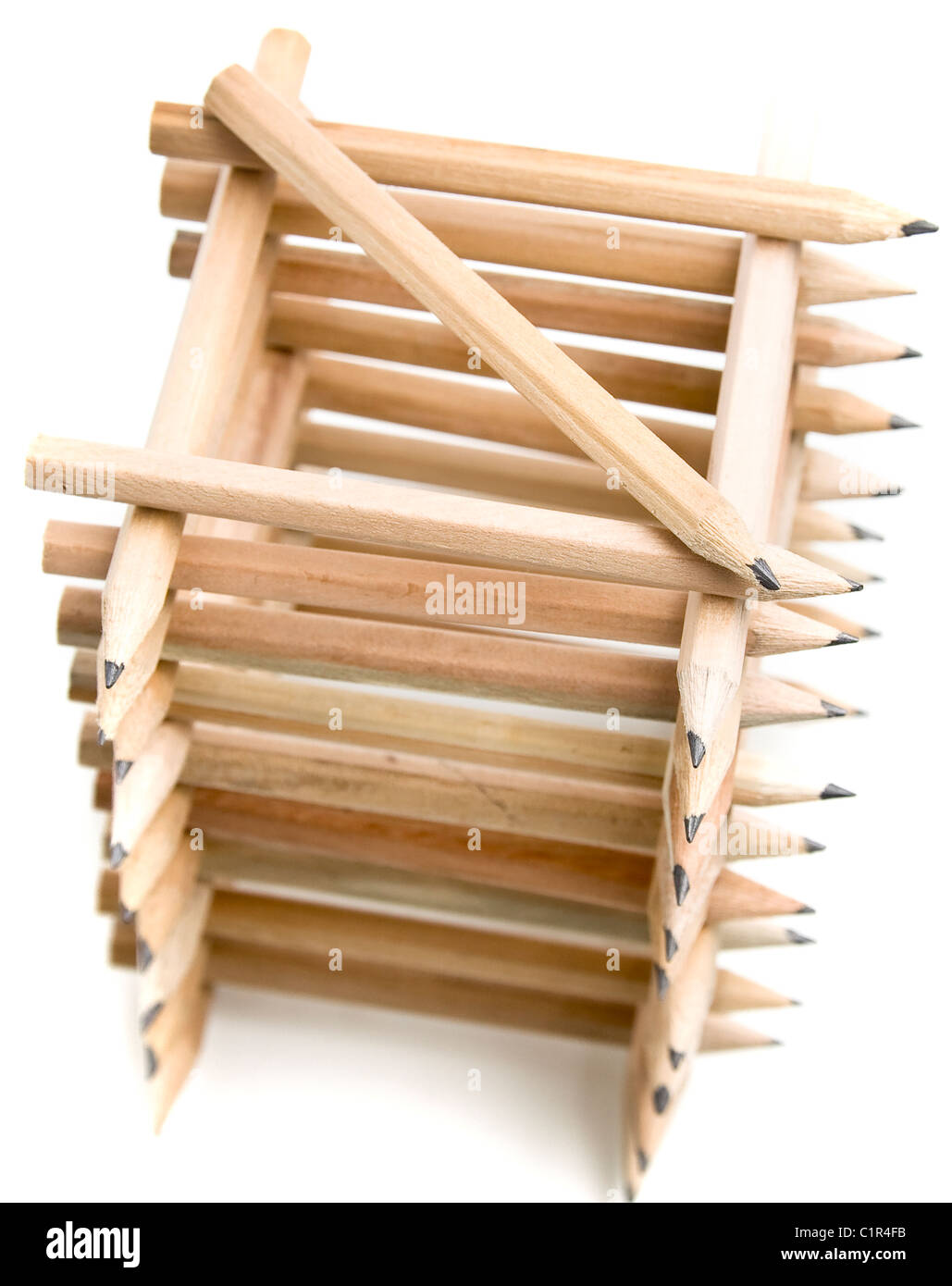 Tower from pencils isolated on white background Stock Photo - Alamy
