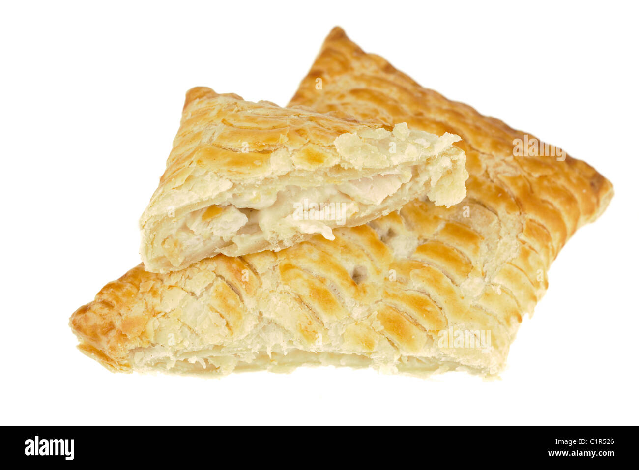 Halved creamed chicken pastry slice Stock Photo - Alamy