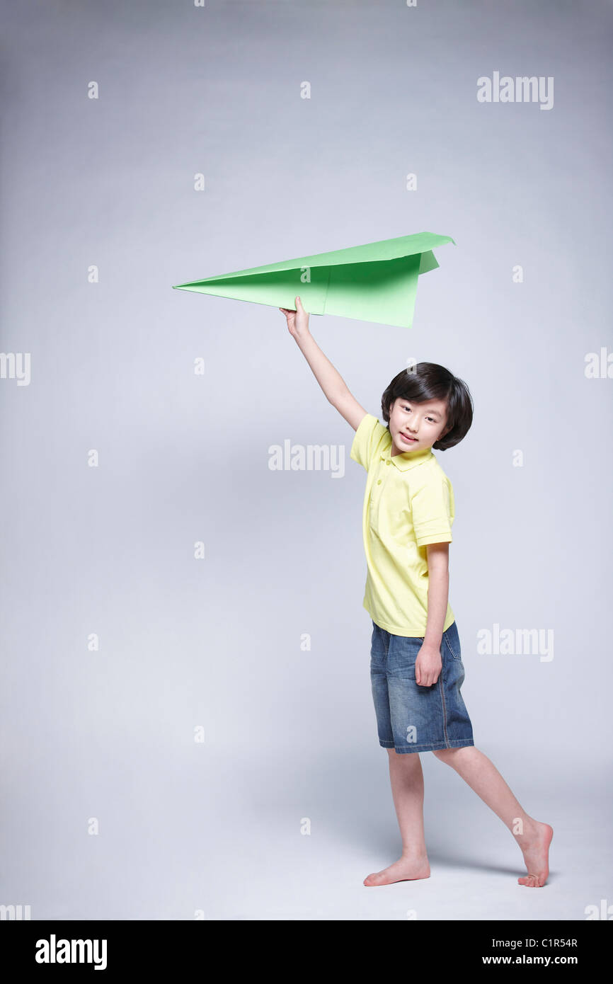 children education boy flying paper plane Stock Photo - Alamy