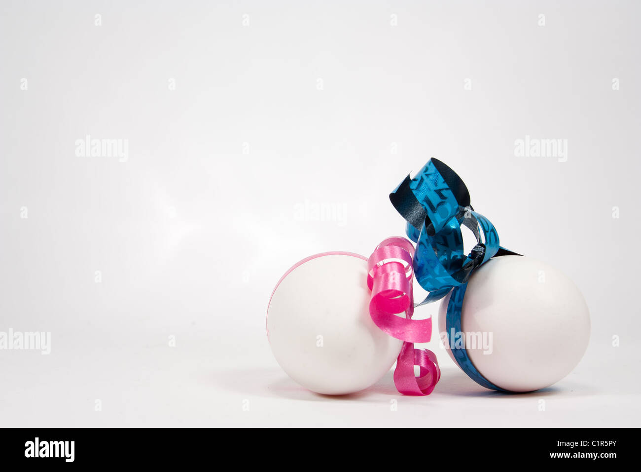 Boy and girl egg with ribbons Stock Photo - Alamy