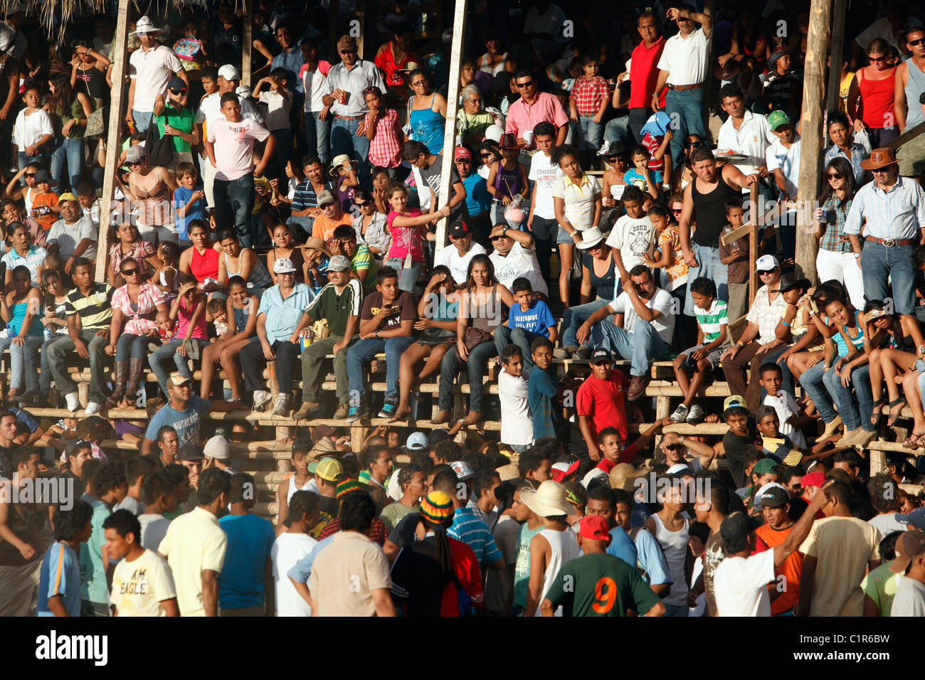 The crowd at a bull riding event as part of a civic festival in Liberia ...