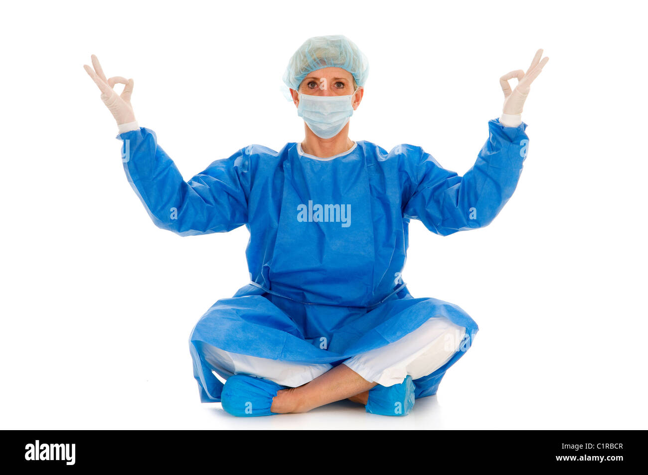 female surgeon practicing yoga Stock Photo - Alamy
