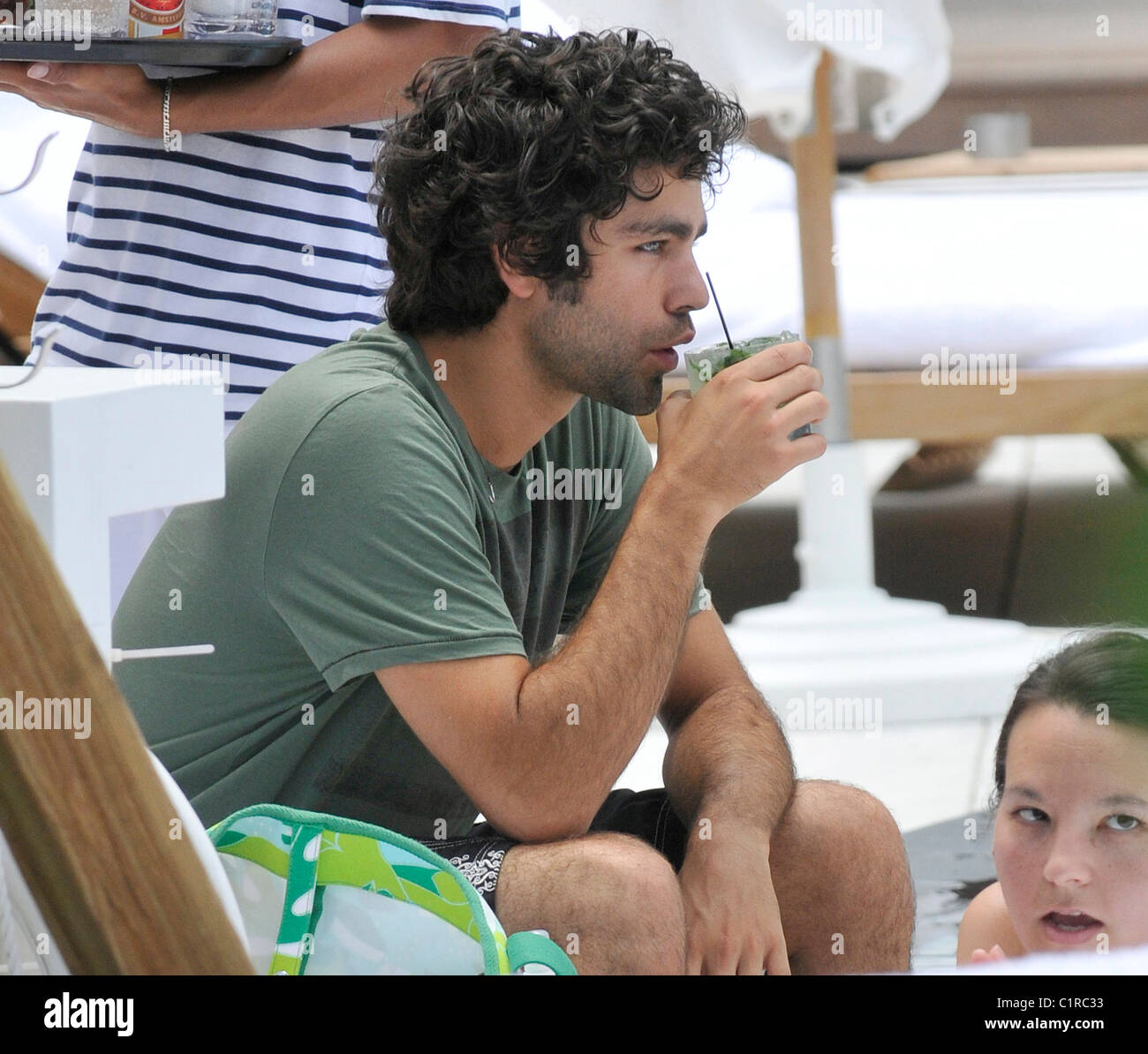 Adrian Grenier on the beach with friends at The W Hotel Miami Beach ...