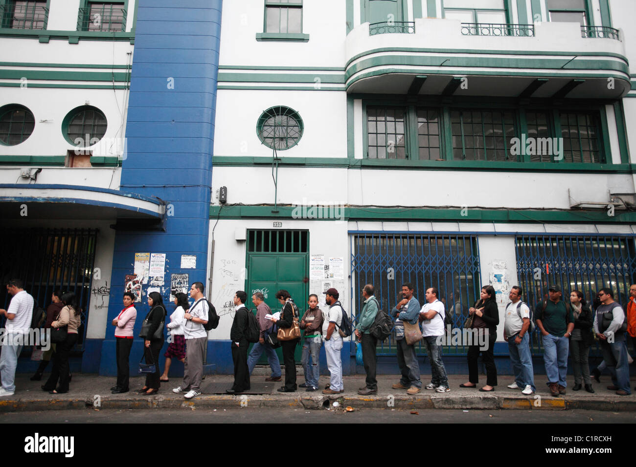 People line up at a bus stop, San Jose, Costa Rica Stock Photo - Alamy
