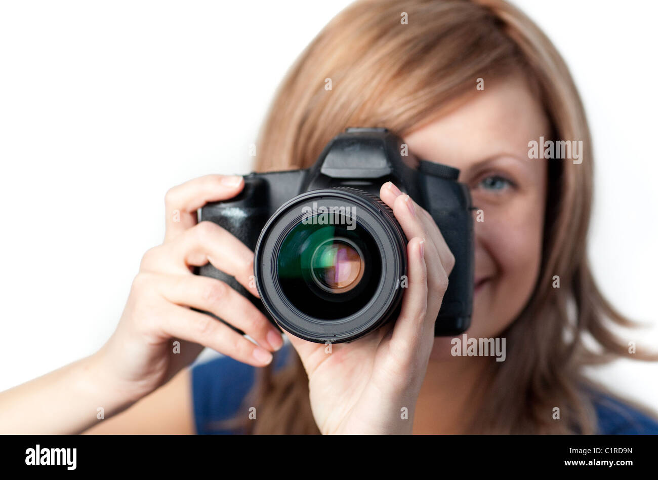 Attractive woman using a camera Stock Photo - Alamy