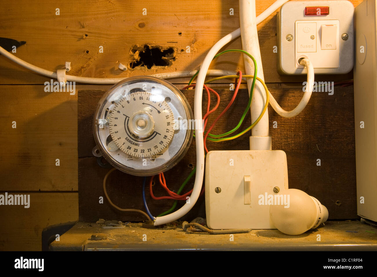 A poor electrical installation including a sangamo timer and switches ...