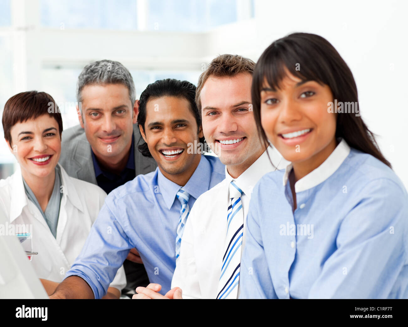 Portrait of ambitious business team at work Stock Photo - Alamy