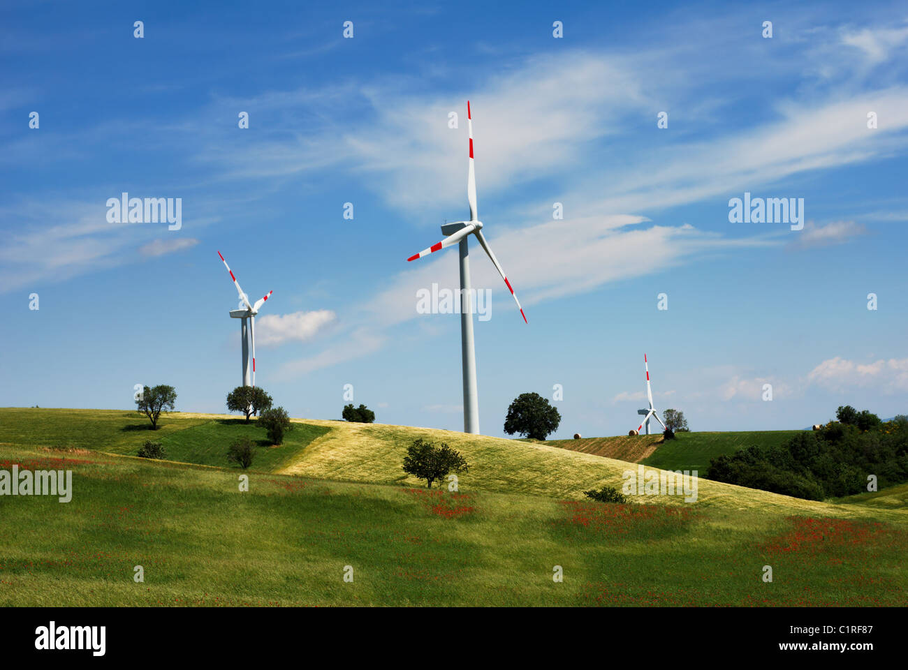 Summer landscape with wind turbines and cultivated fields Stock Photo ...