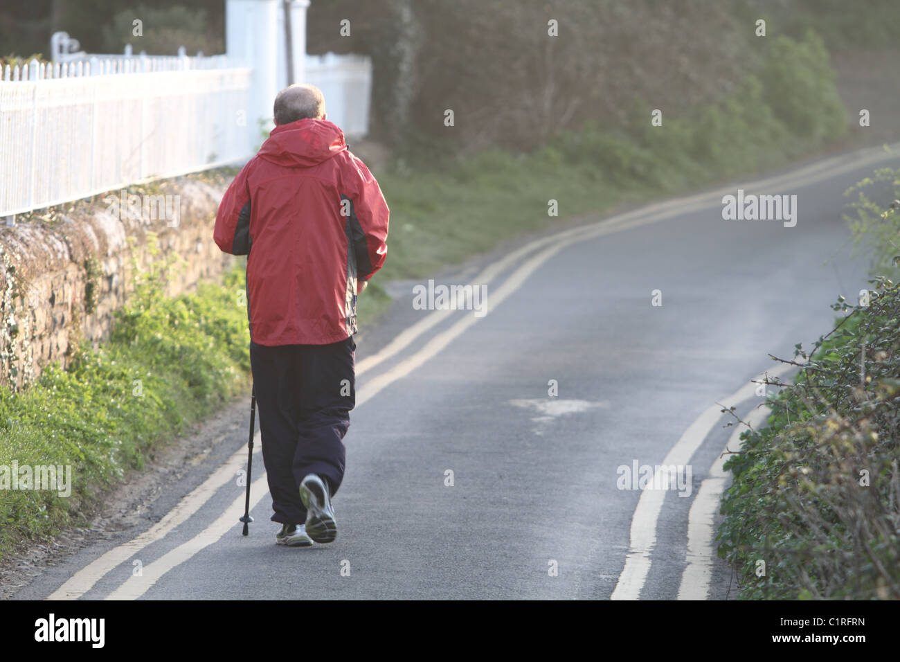 Old man walking stick run hi-res stock photography and images - Alamy