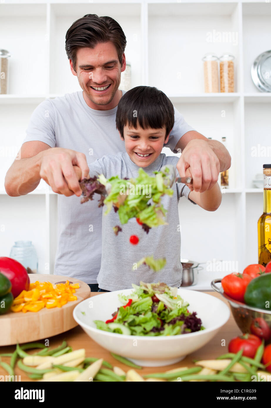 Little boy and his father cooking Stock Photo - Alamy