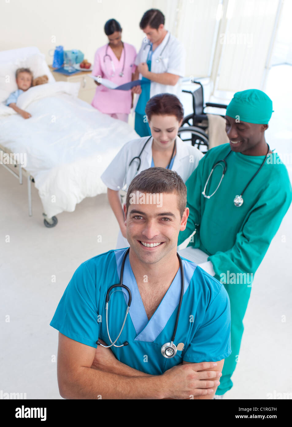 High angle of medical team attending to a child Stock Photo - Alamy
