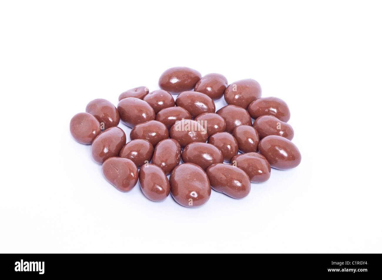 A selection of milk chocolate covered peanuts traditional sweets on a ...