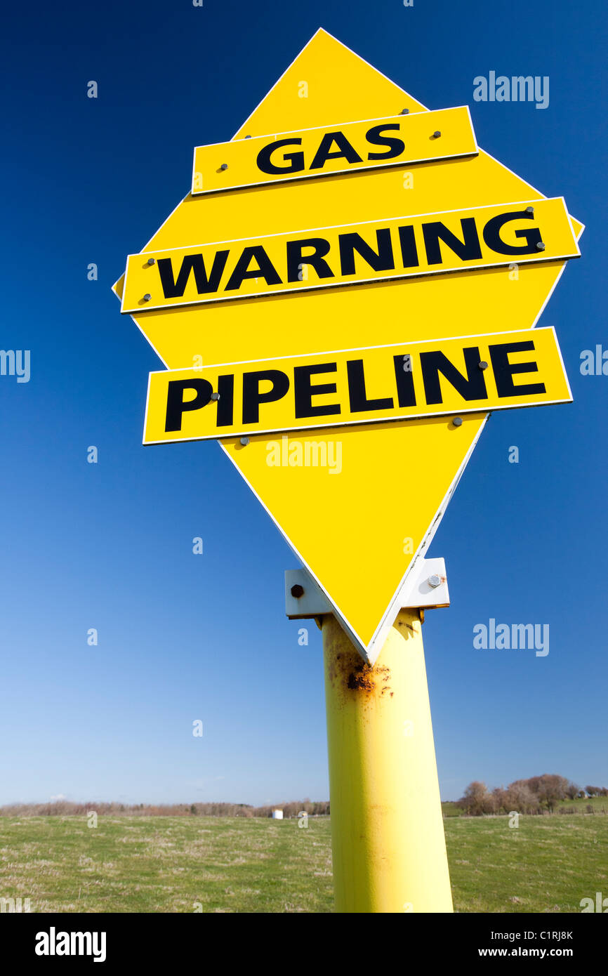 A warning sign for the gas pipeline which brings natural gas from the ...