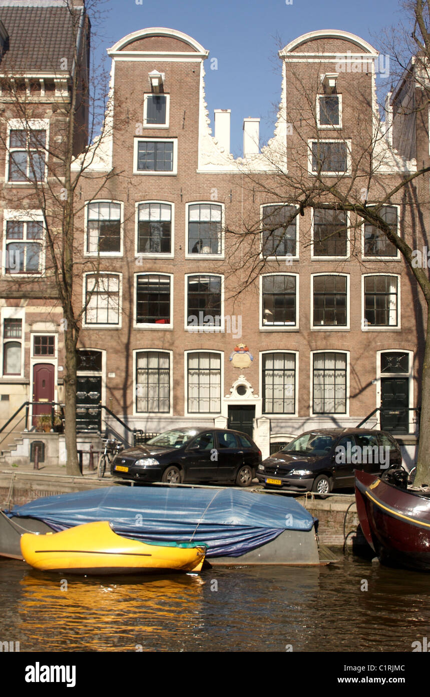 Boat in the shape of a clog in front of typical dutch house in ...