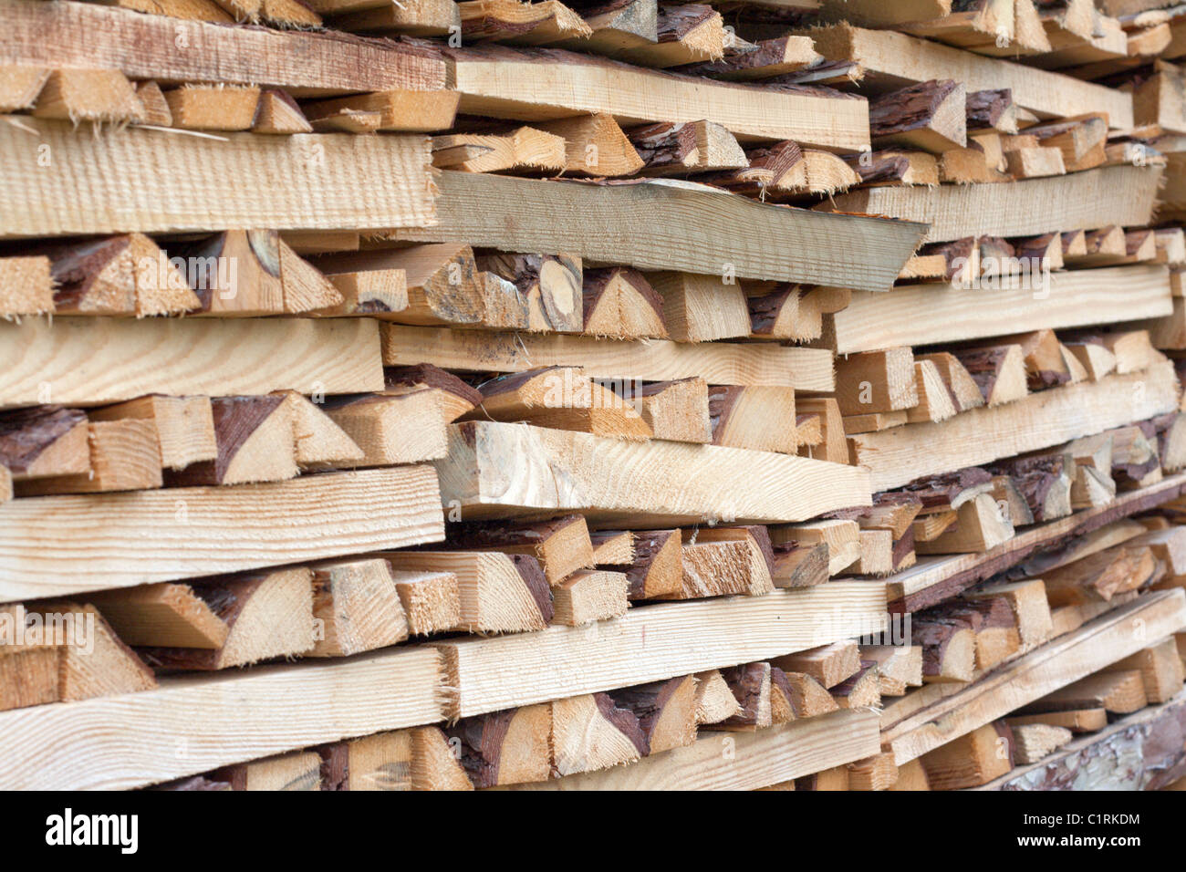 Firewood, boards by built rows in the manner of envelope Stock Photo ...