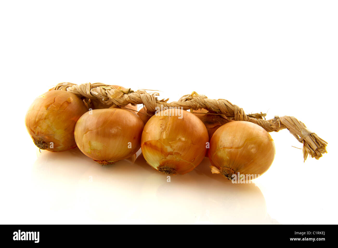 raw onions in string Stock Photo - Alamy