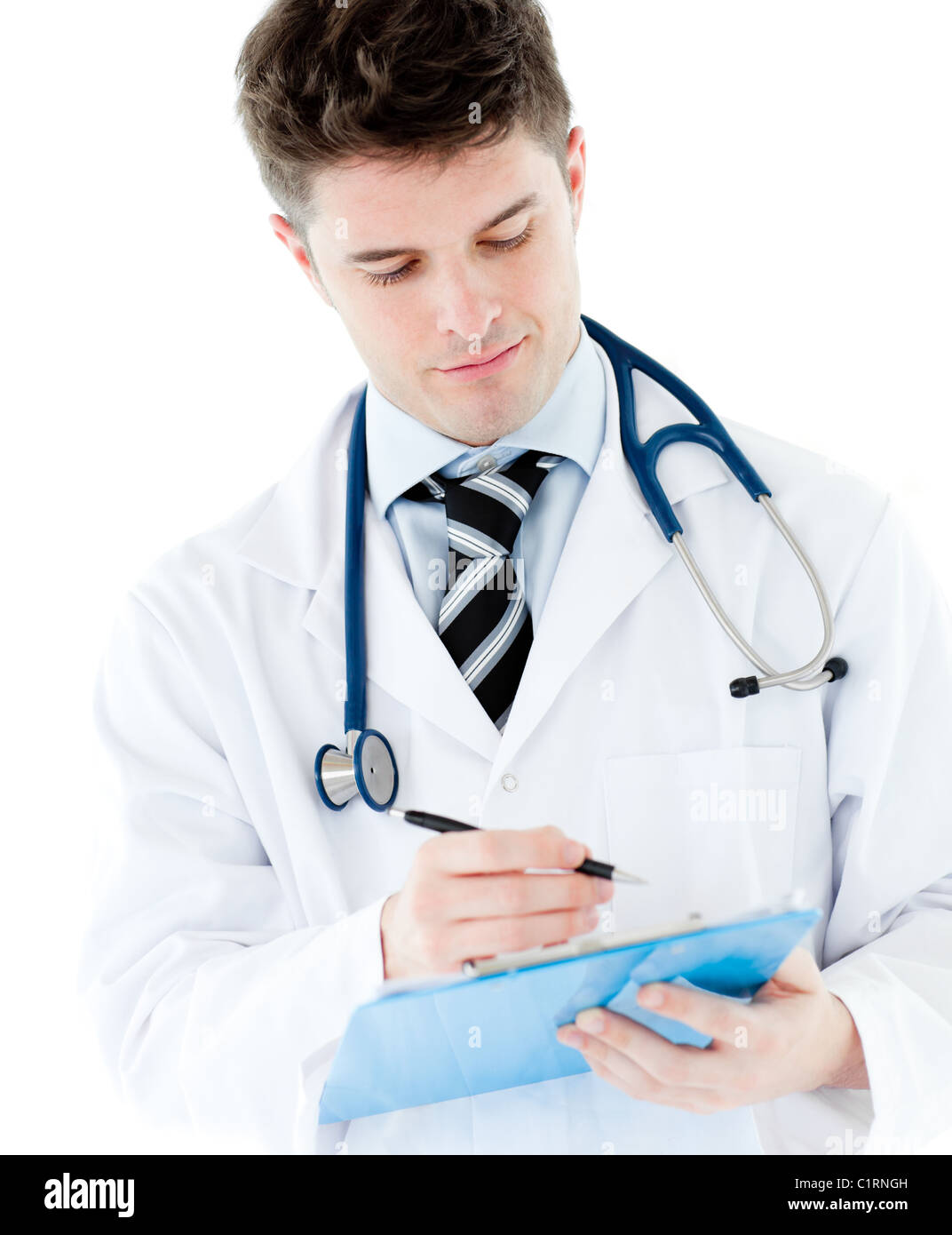 Attractive doctor holding pen Stock Photo - Alamy