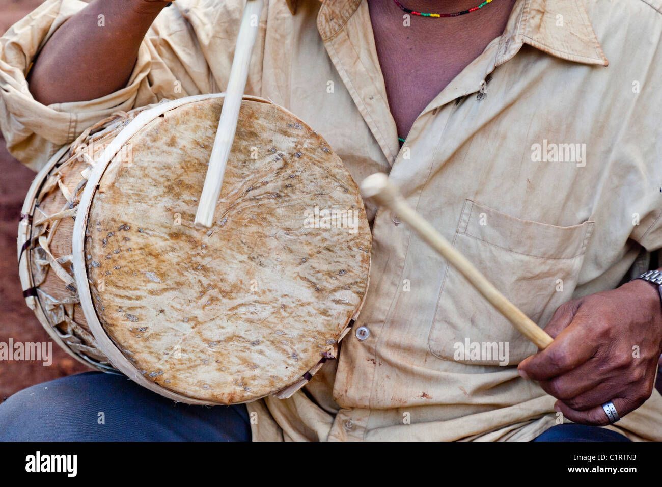 Traditional Mbya Guarani drum (anguapu) carved from the trunk of a palm ...