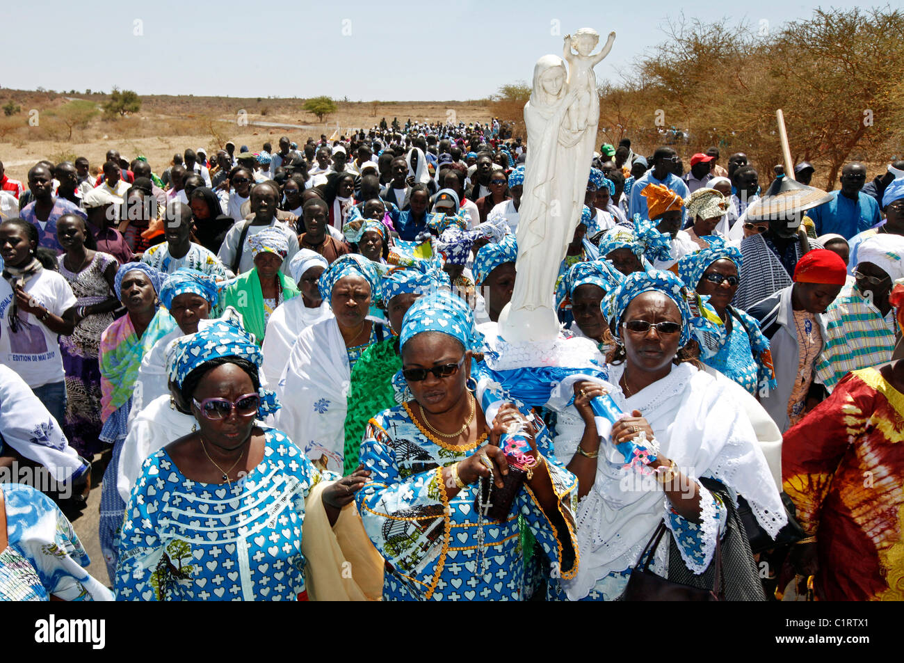 Statue of Mother Mary carried by catholic woman during Mont Rolland ...