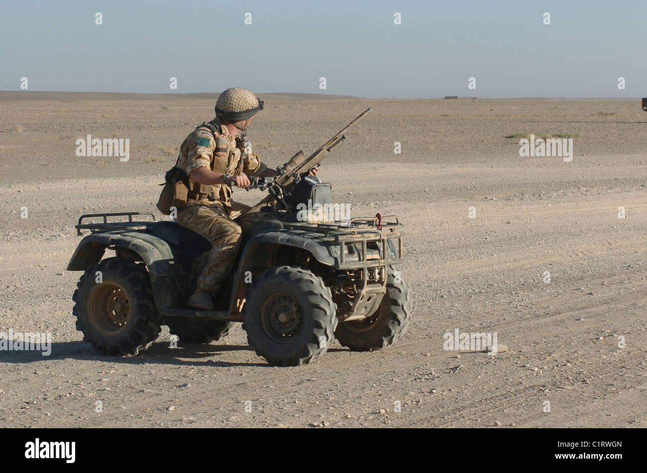 A British Army soldier provides security outside Camp Bastion ...