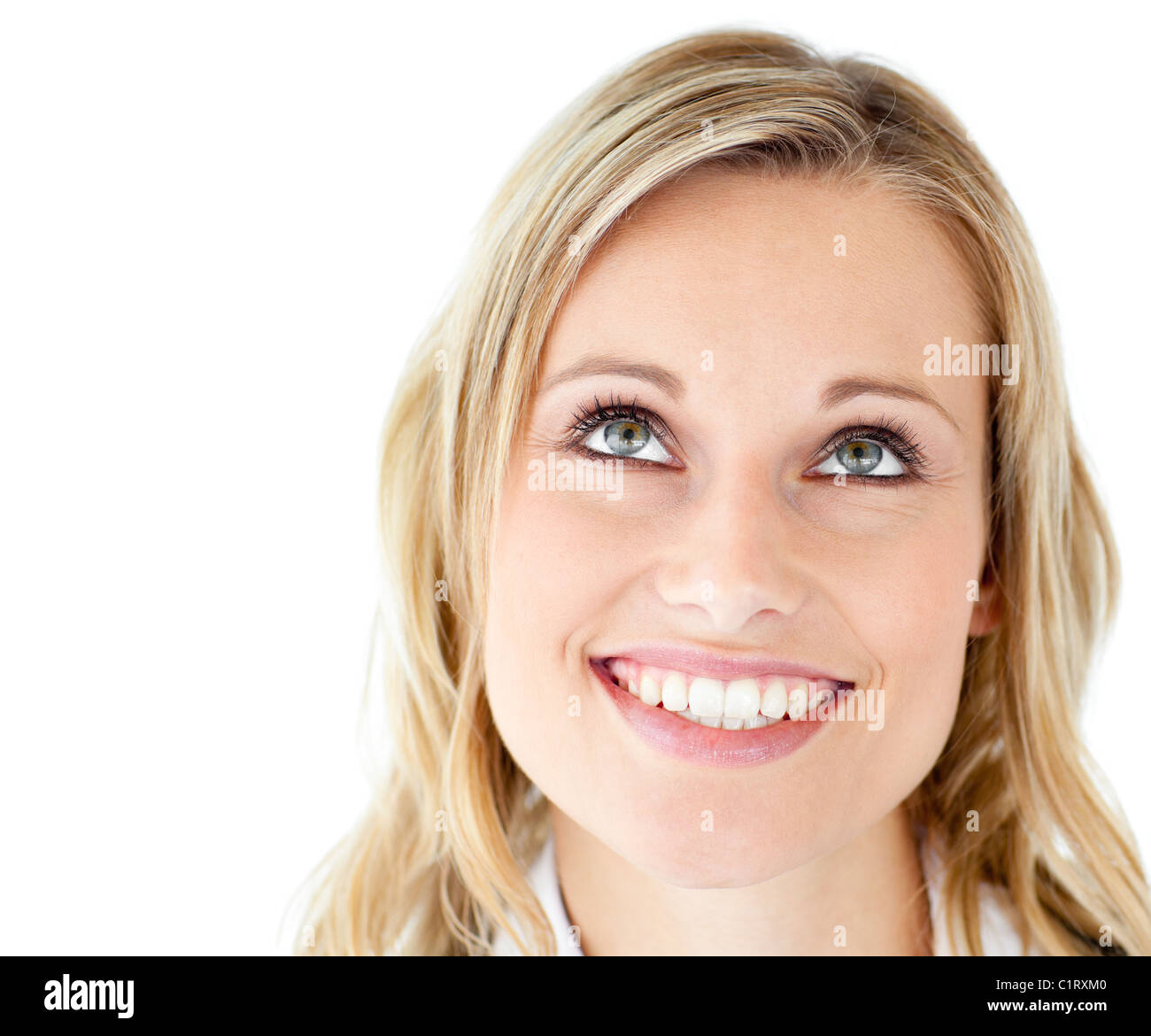 Portrait of a smiling businesswoman looking upwards Stock Photo - Alamy