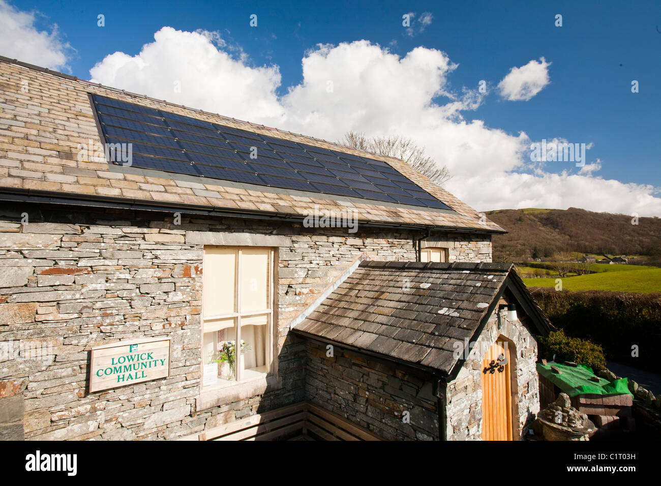 Solar electric panels on Lowick Village Hall in South Cumbria, UK Stock ...