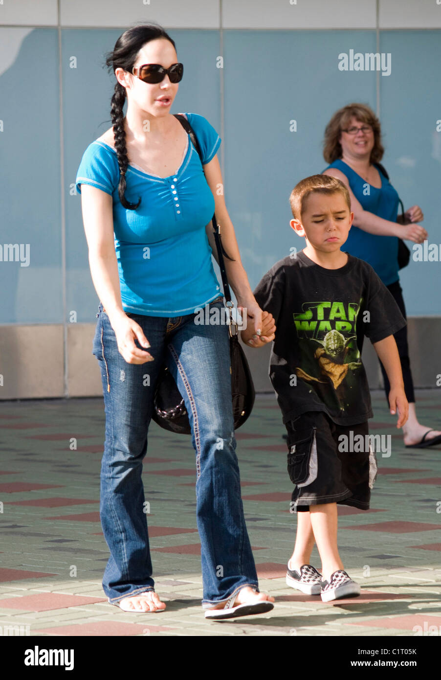 Nadya Suleman aka Octomom steps out with one of her 14 children ...