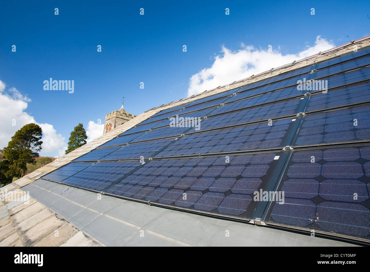 Solar electric panels on Lowick Village Hall in South Cumbria, UK Stock ...