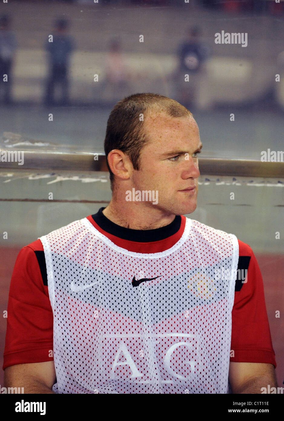 Manchester United`s Wayne Rooney sits on the bench during a friendly ...