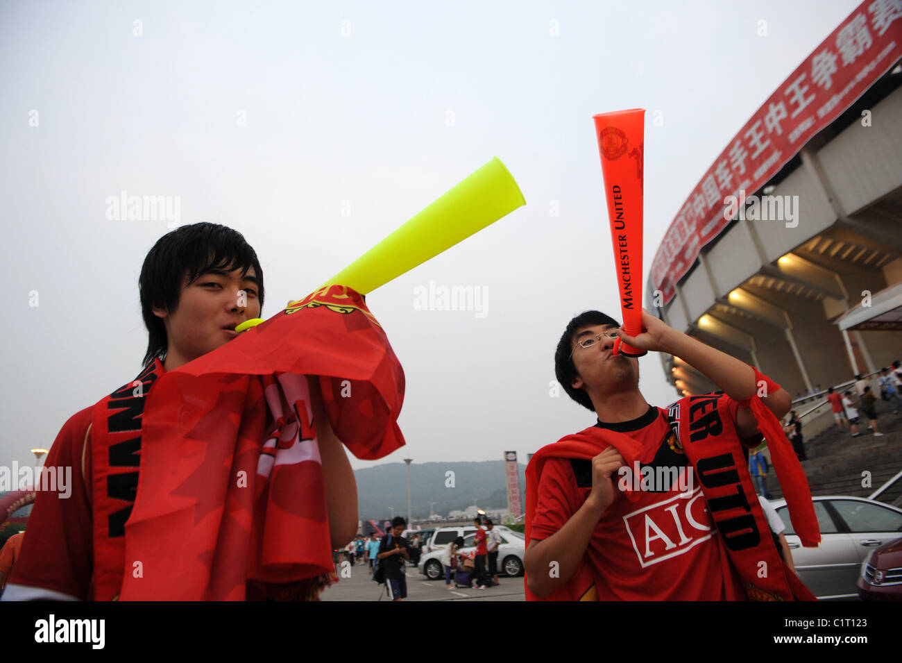 Chinese supporters of Manchester United gather outside the stadium ...