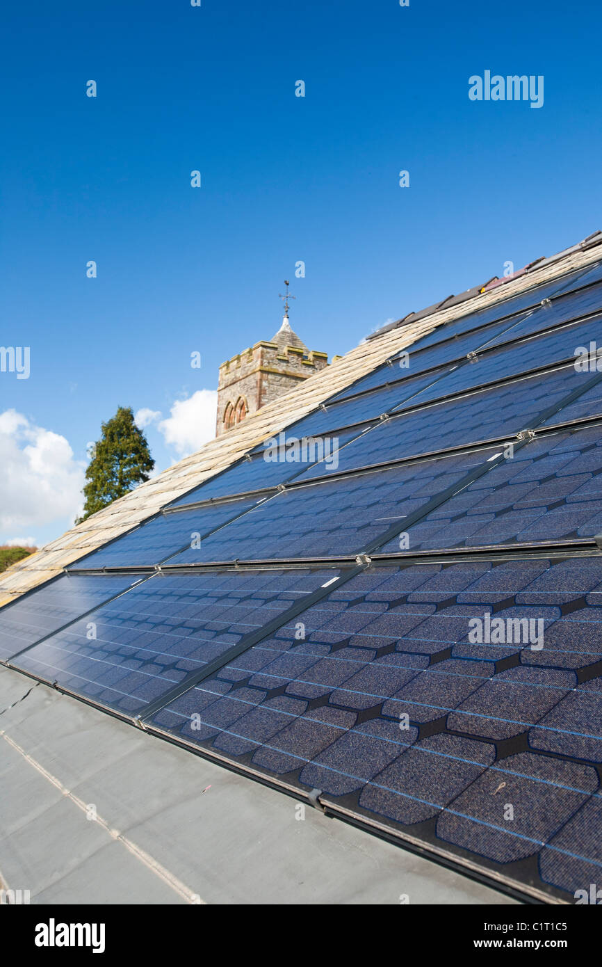 Solar electric panels on Lowick Village Hall in South Cumbria, UK Stock ...