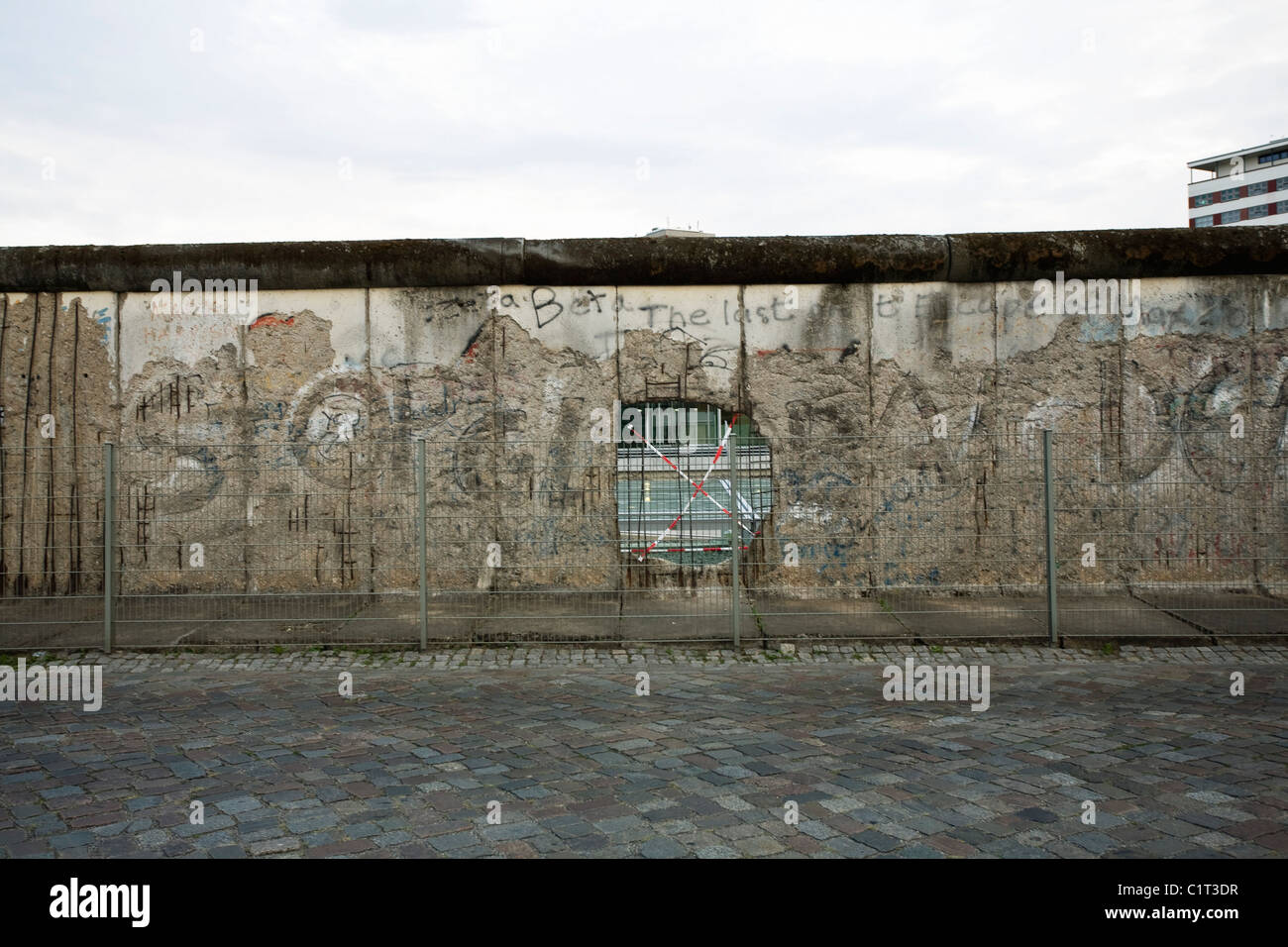 Berlin wall with holes hi-res stock photography and images - Alamy