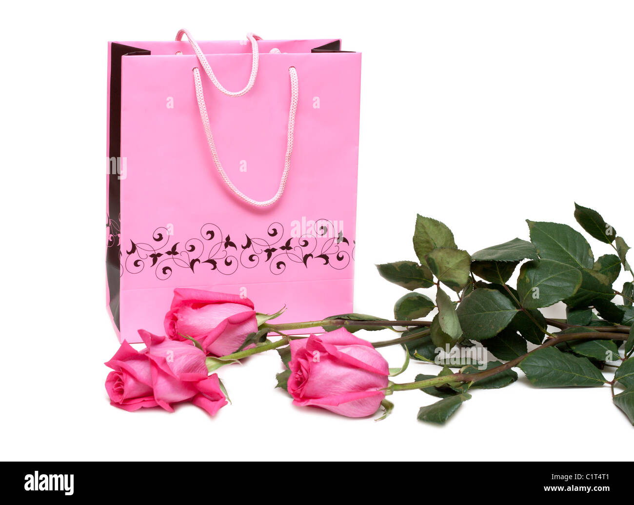 Beautiful three pink roses isolated Cut Out Stock Images & Pictures - Alamy