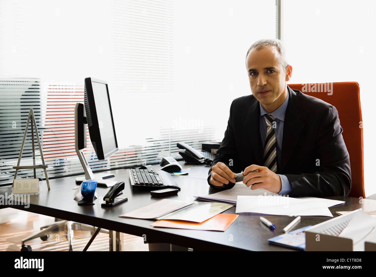Executive in office, portrait Stock Photo - Alamy